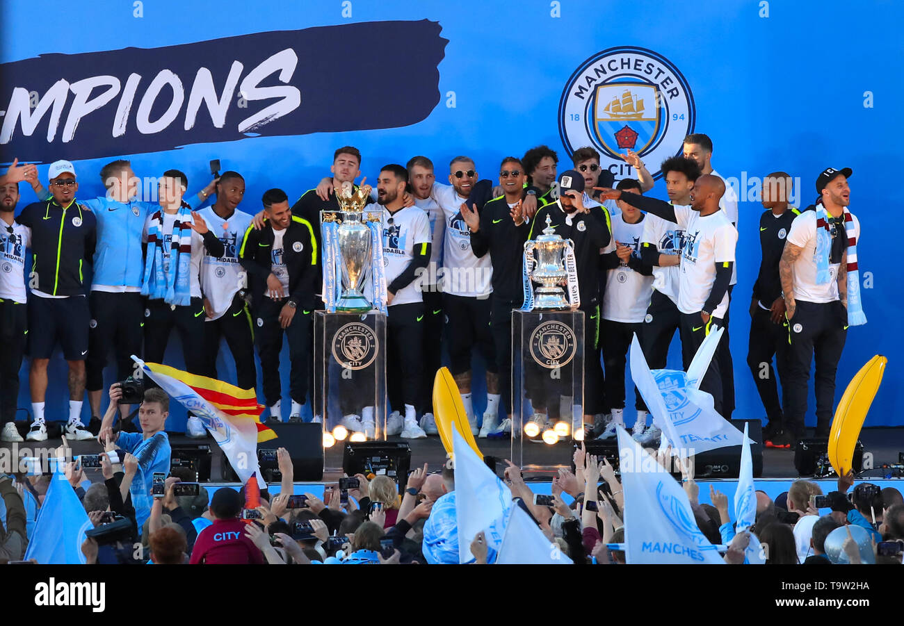Manchester City players and staff on stage during the trophy parade in ...