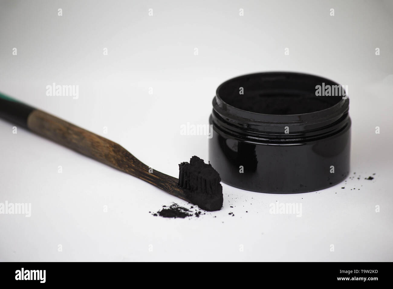Charcoal powder teeth hi-res stock photography and images - Alamy
