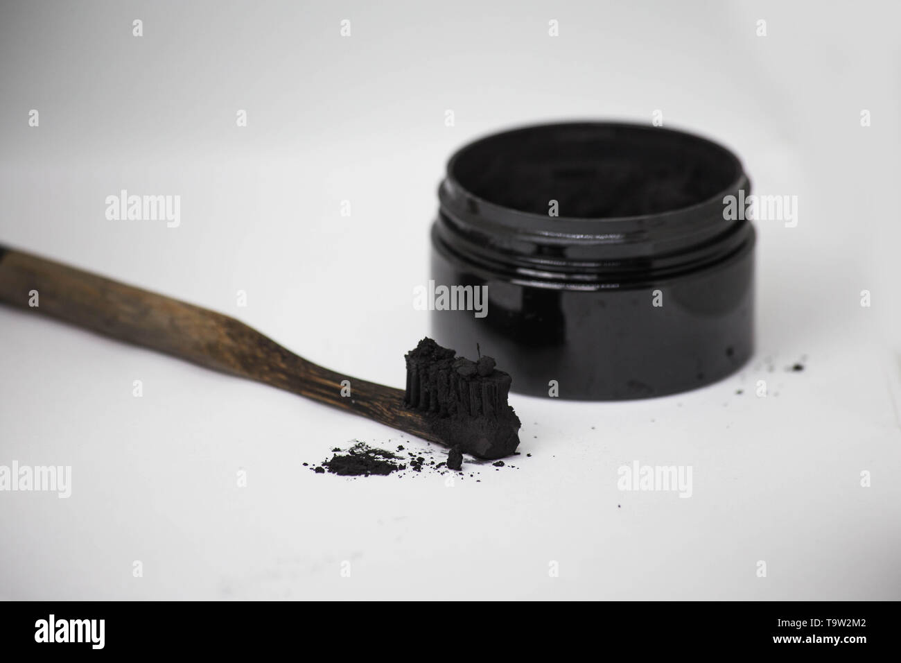 Charcoal powder teeth hi-res stock photography and images - Alamy