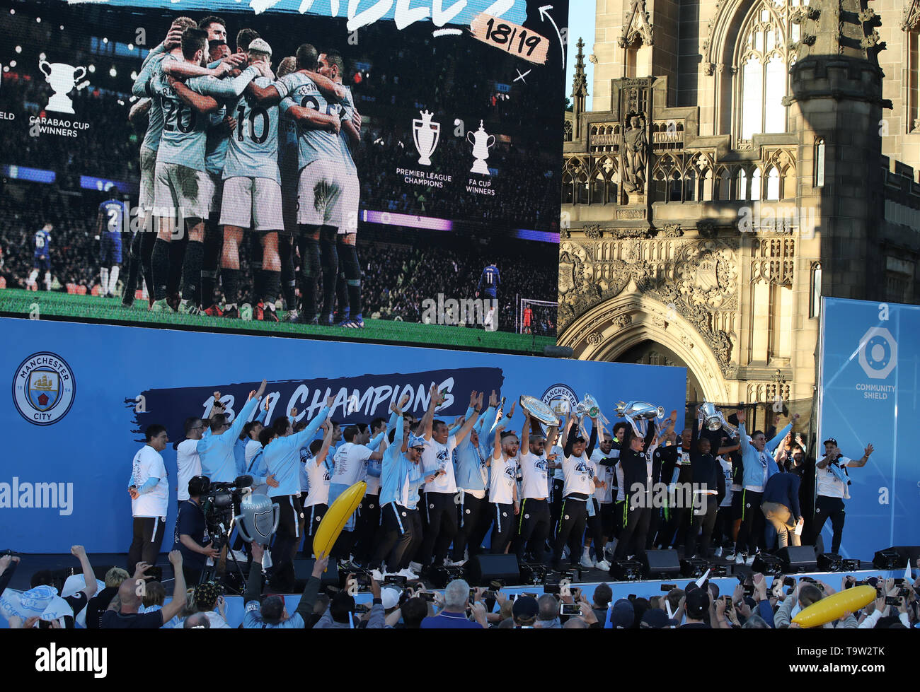 Manchester City celebrate onstage during the trophy parade in ...