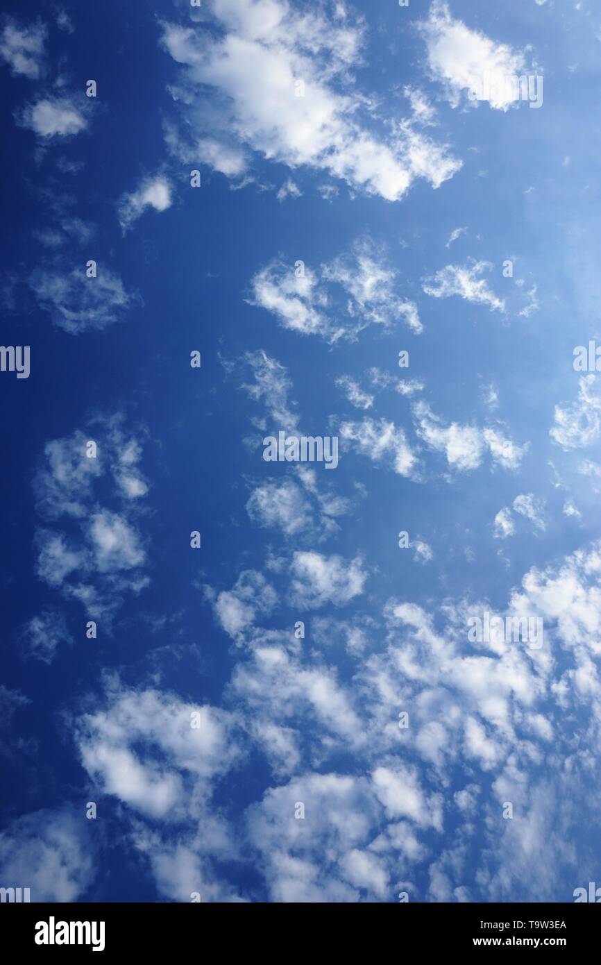 Clear blue sky with clouds hi-res stock photography and images - Alamy