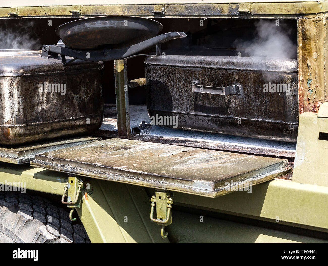 Mobile metal military kitchen stove to feed soldiers Stock Photo - Alamy