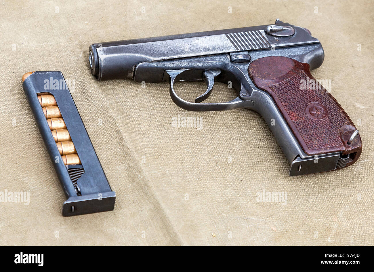 Old soviet army handgun with ammunition close up Stock Photo - Alamy