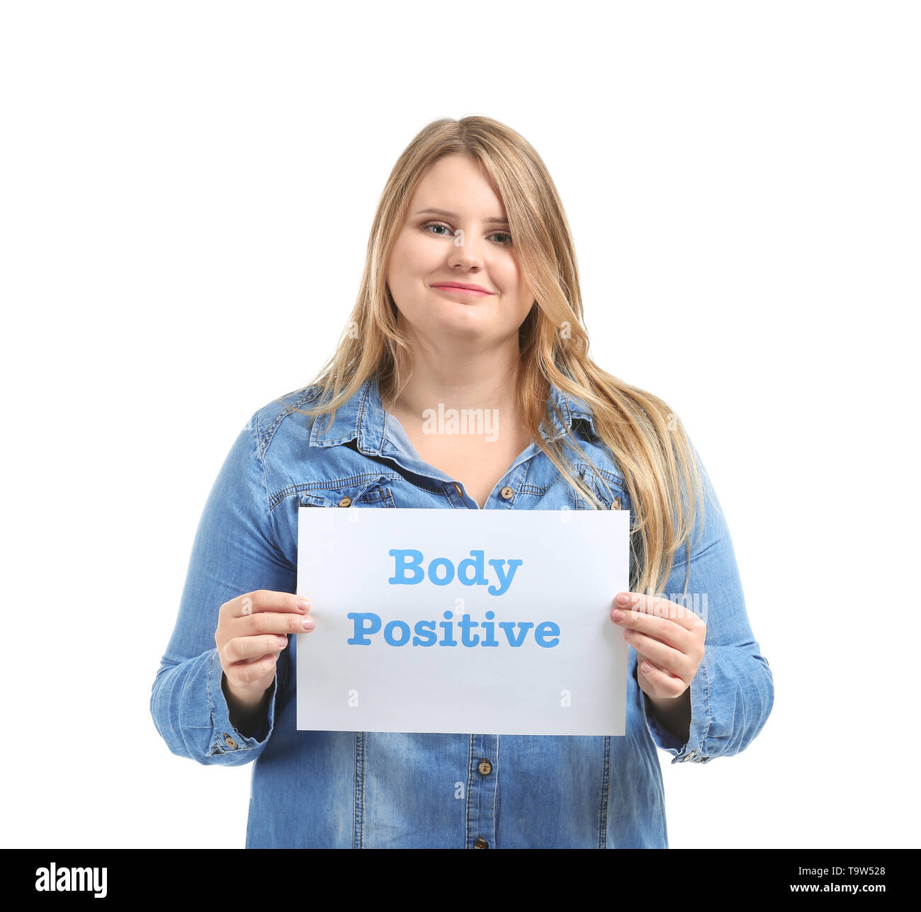 Beautiful plus size girl holding paper sheet with text BODY POSITIVE on ...