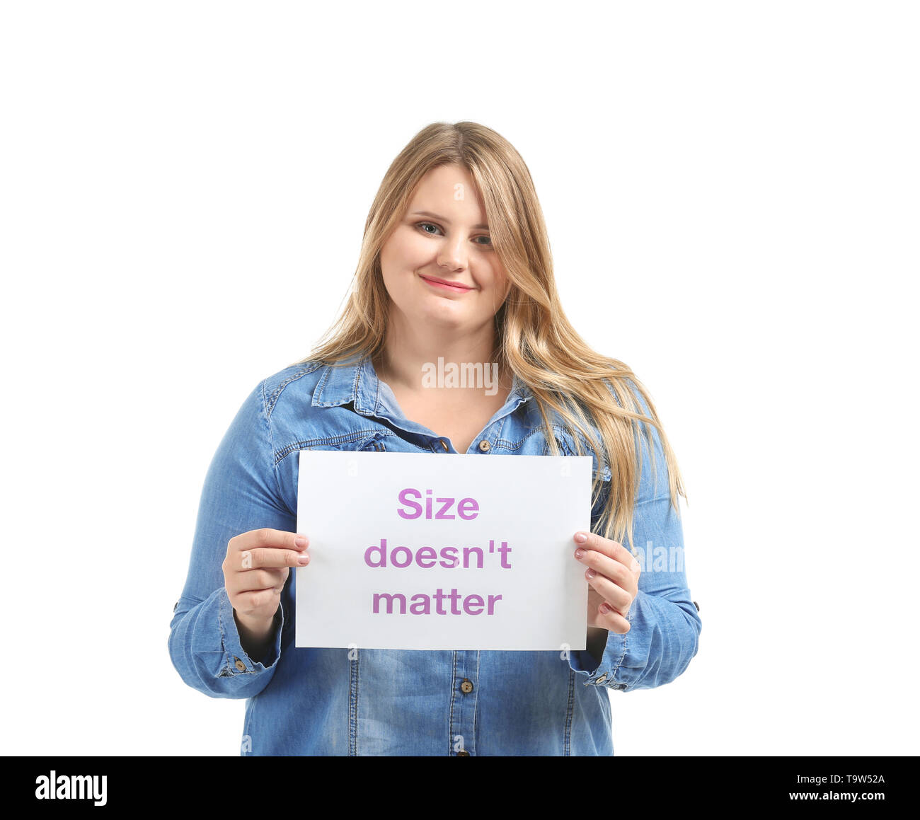 Beautiful plus size girl holding paper sheet with text SIZE DOESN'T ...