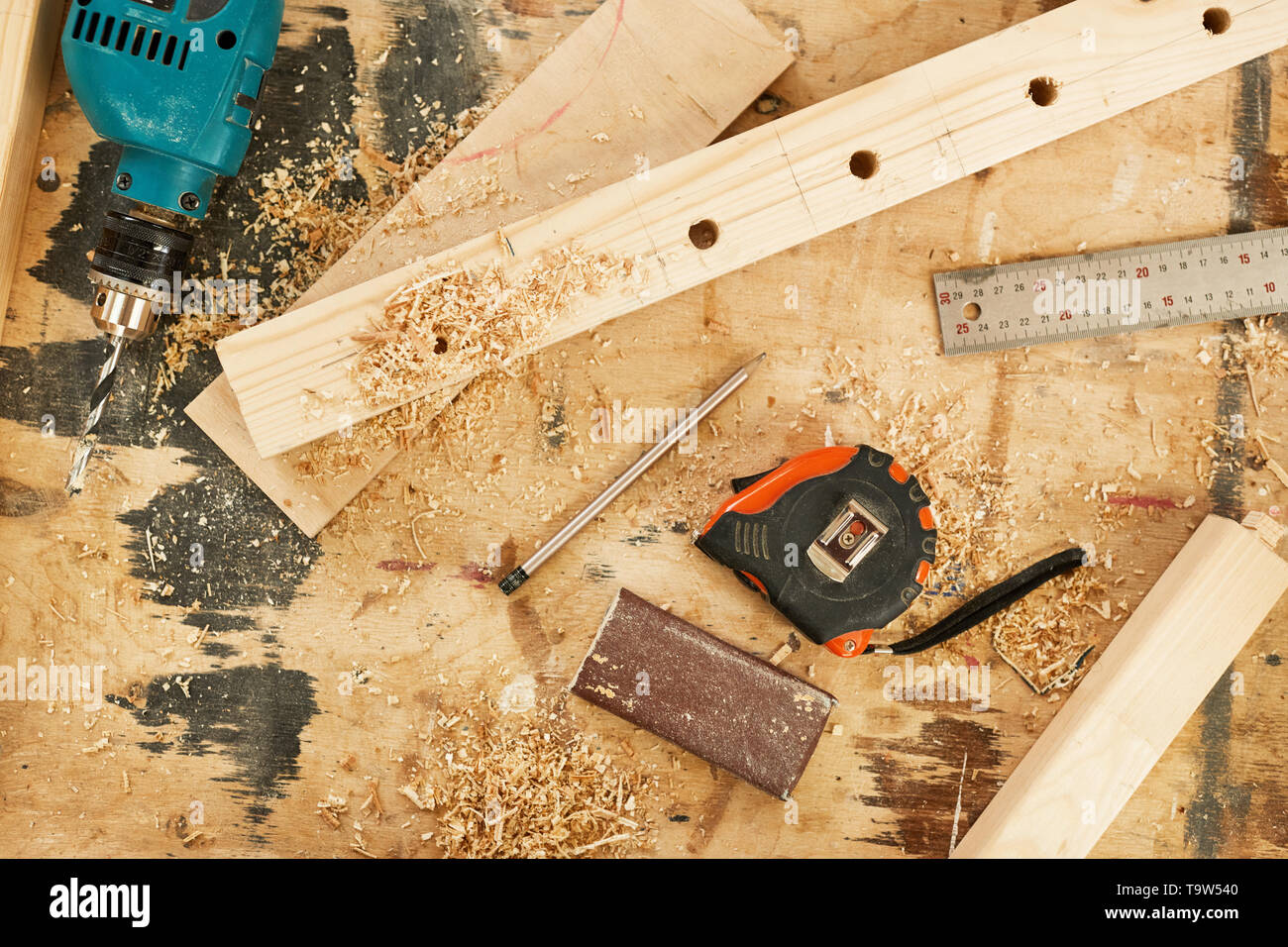 Top view background of tools and wood lying on table in carpenters ...