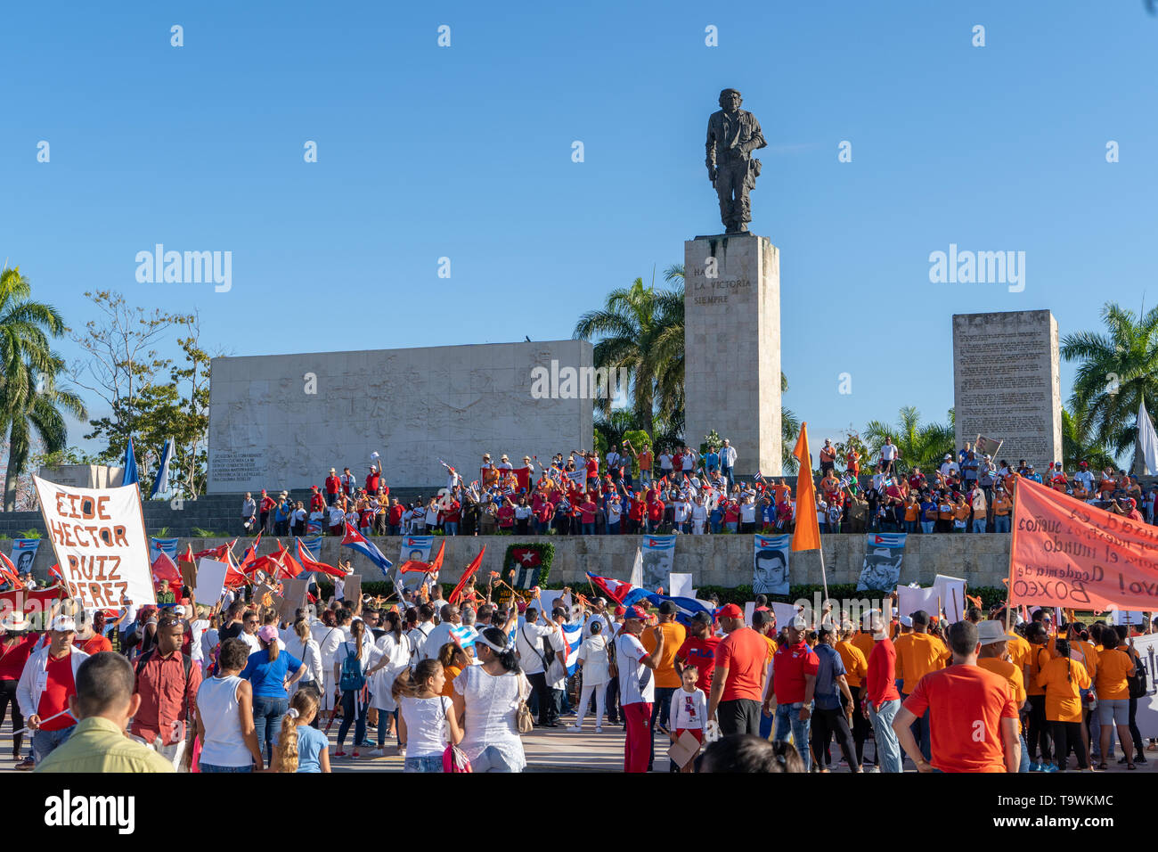 Santa Clara, Cuba May 1, 2019: Group of people standing with posters ...