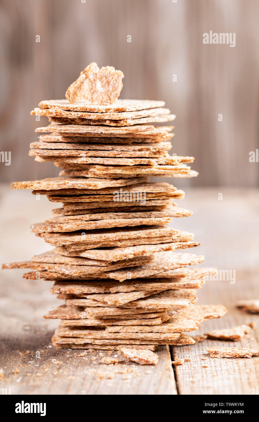 Close-up vertical stack of broken pieces of healthy dietary corn ...