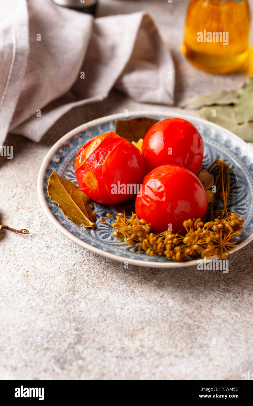 Homemade pickled tomato with spices Stock Photo - Alamy