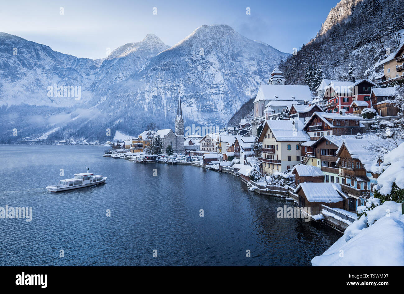 Classic postcard view of famous Hallstatt lakeside town with ... Classic postcard view of famous Hallstatt lakeside town with ...