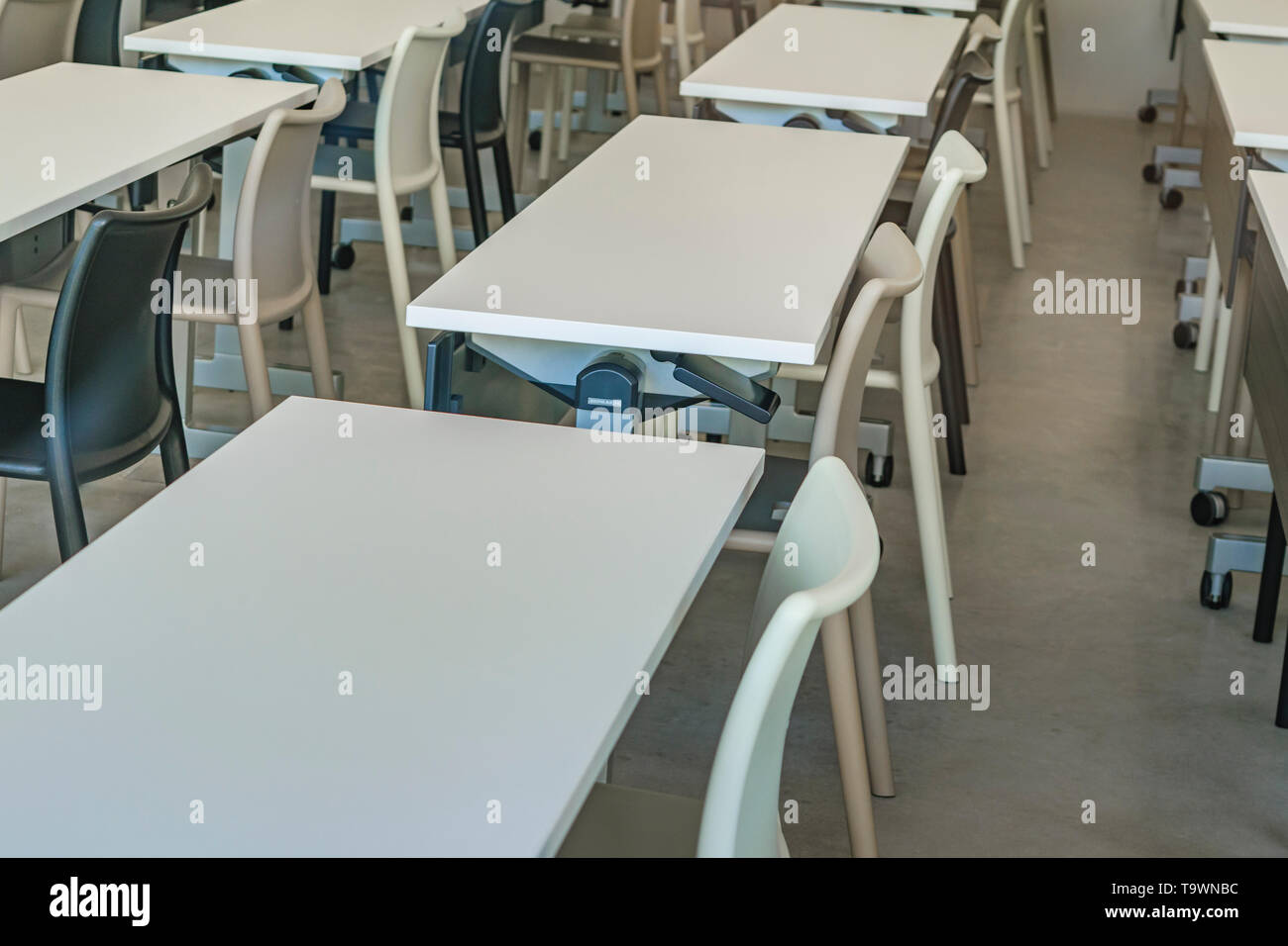 Row of empty school chairs hi-res stock photography and images - Alamy