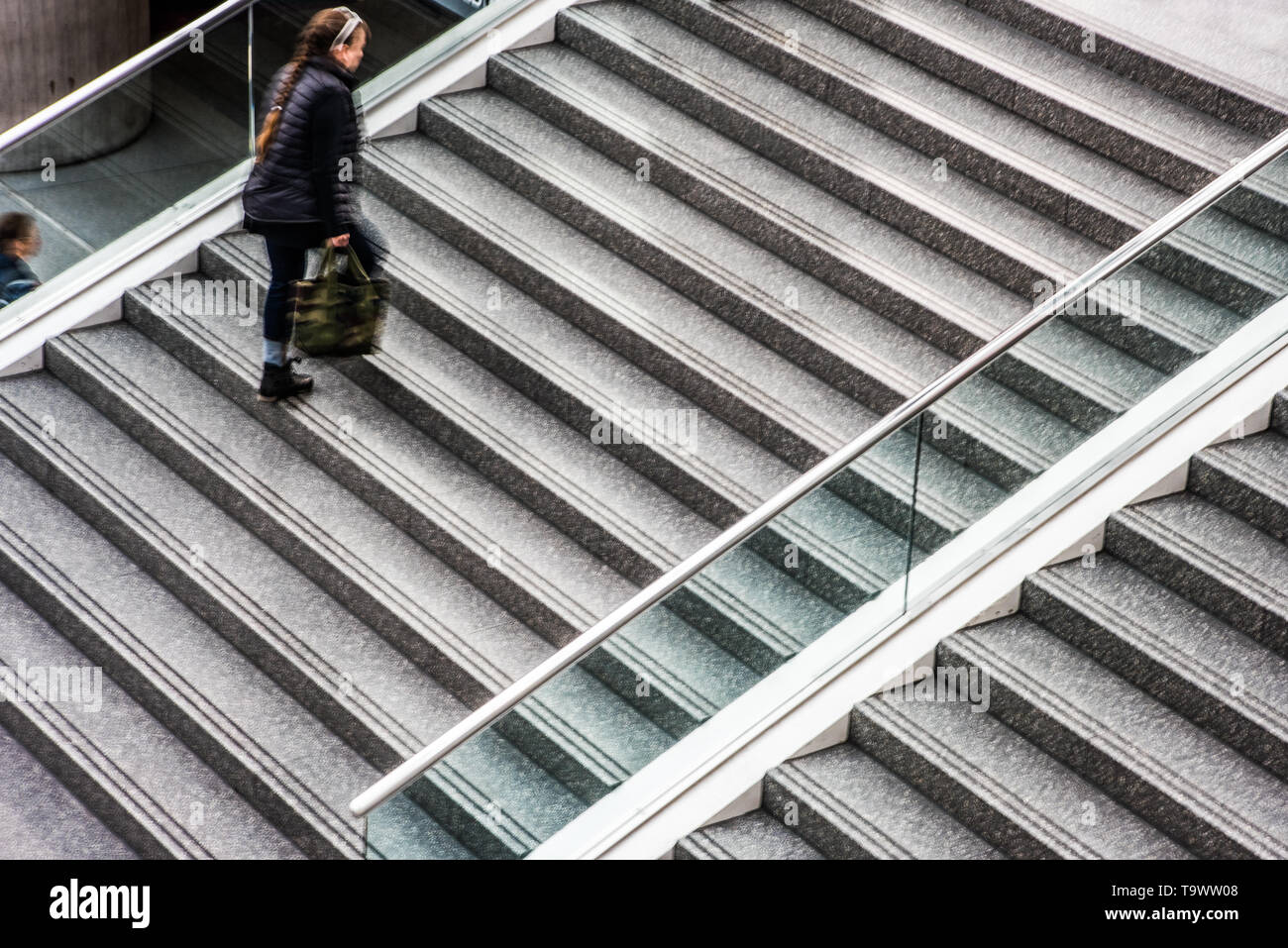 People walking down concrete steps stairs hi-res stock photography and ...