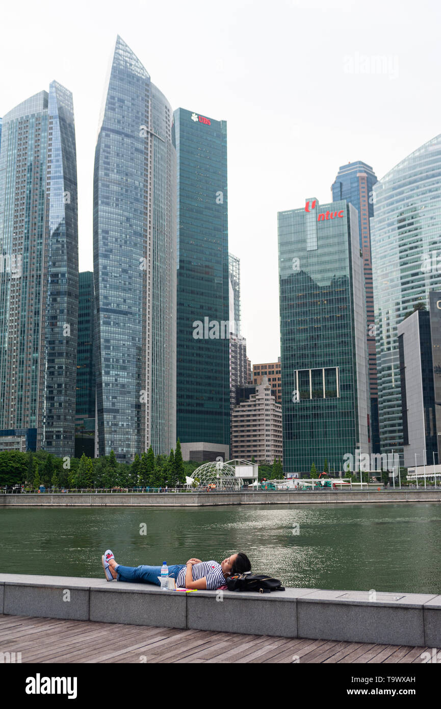 10.05.2019, Singapore, Republic of Singapore, Asia - Woman sleeps at ...