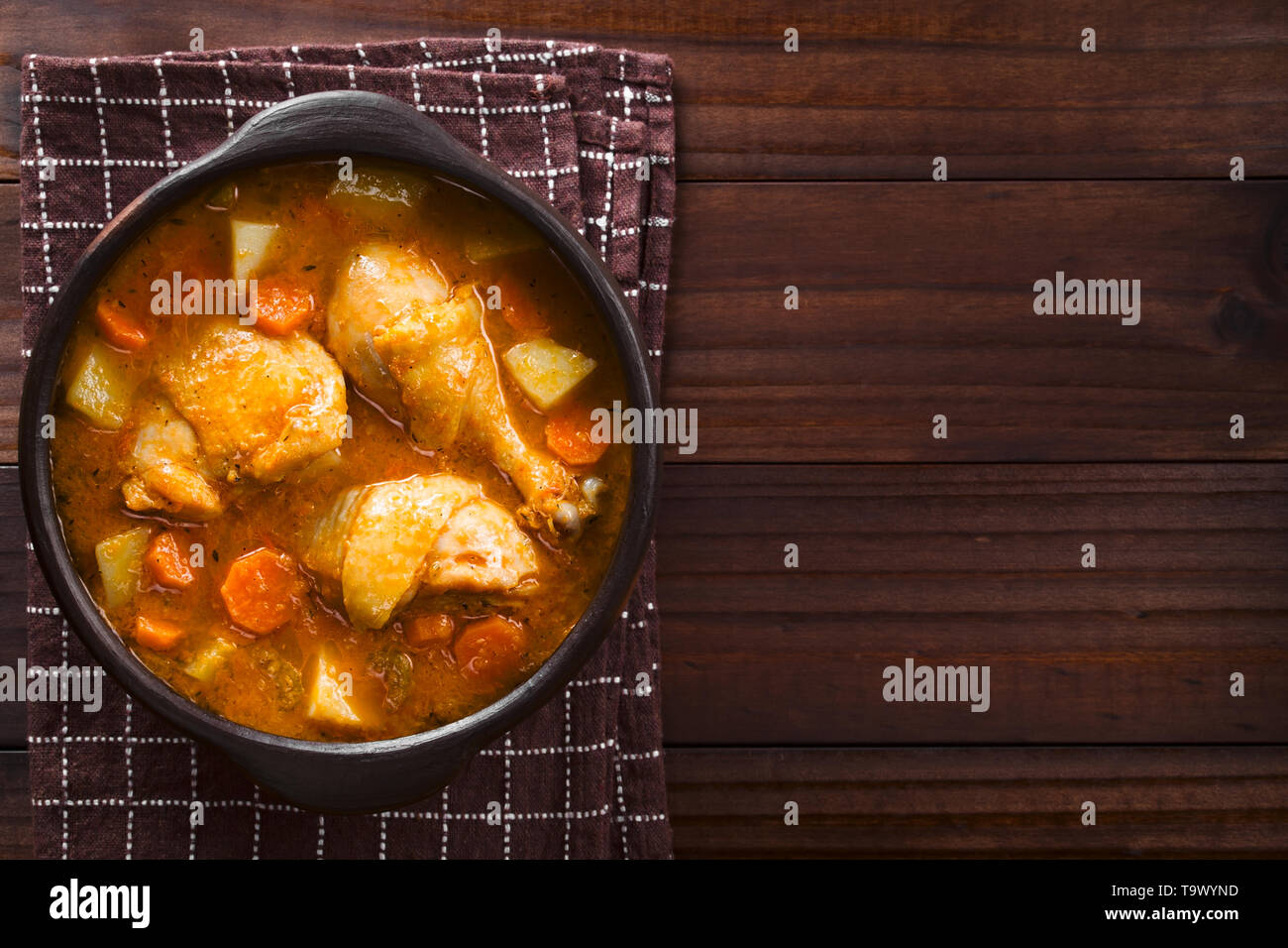 Fresh homemade chicken stew with potato, carrot and celery, seasoned ...
