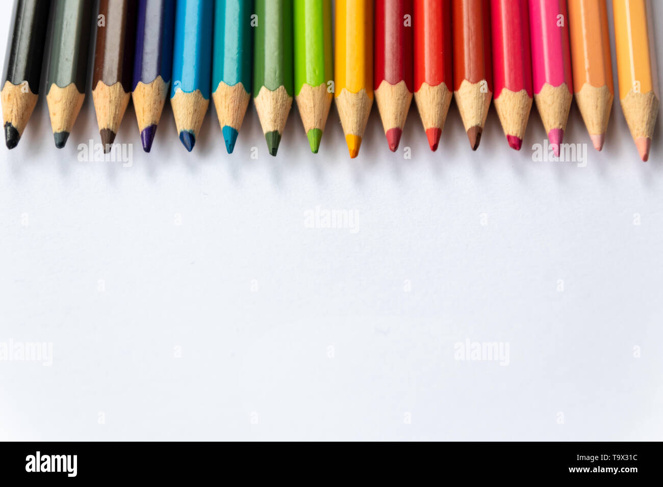 Set of colored pencils in rainbow colors wait for their first picture ...