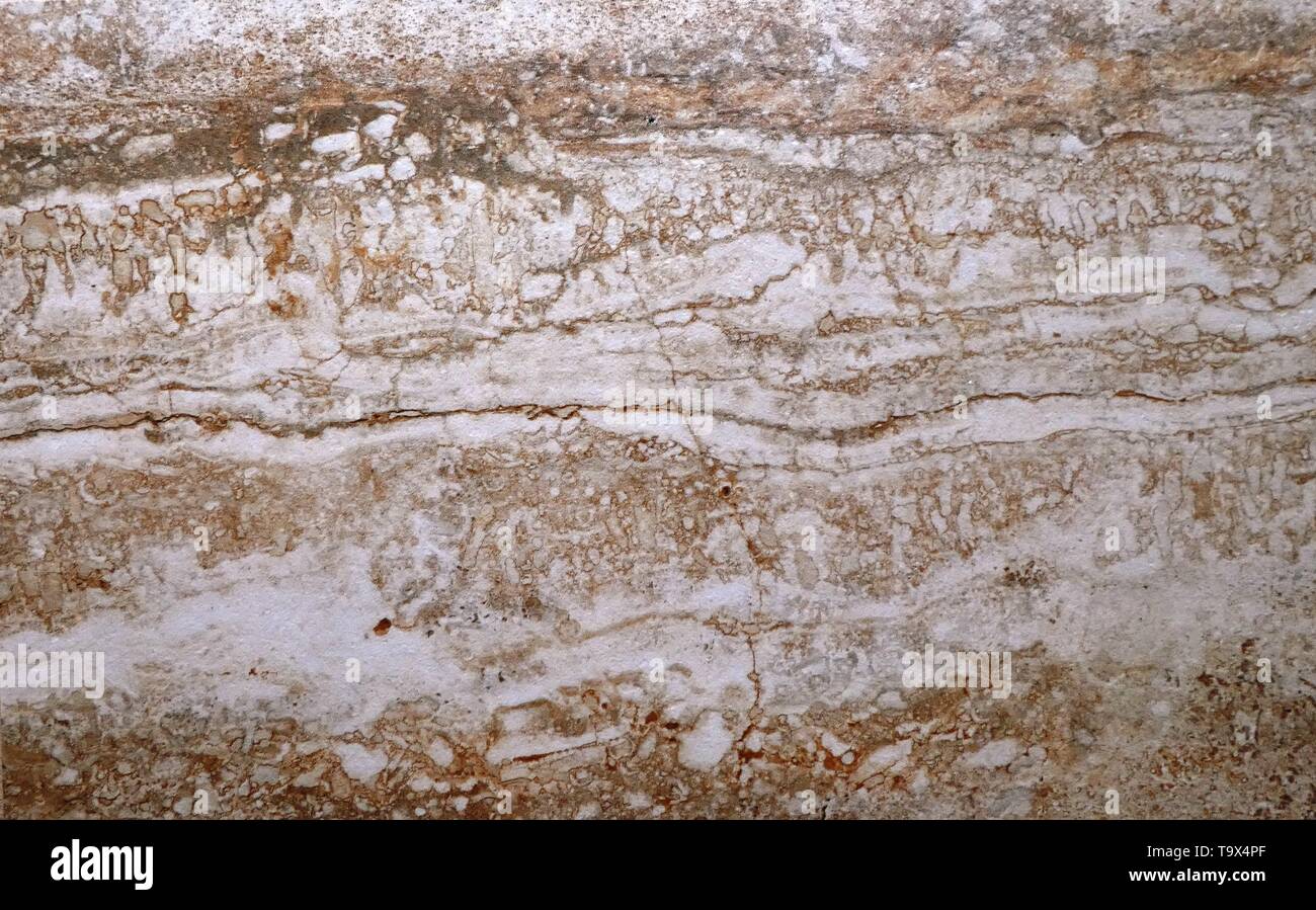 Closeup image of a natural marble tile with colorful veins arranged in ...