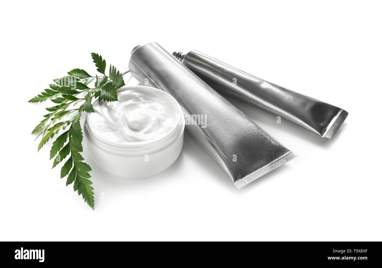 Cosmetic products on white background Stock Photo - Alamy