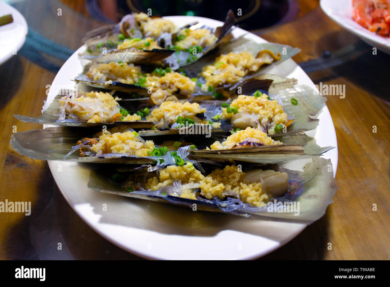 Abalone delicacy on a restaurant inside the Seafood market of Haikou ...