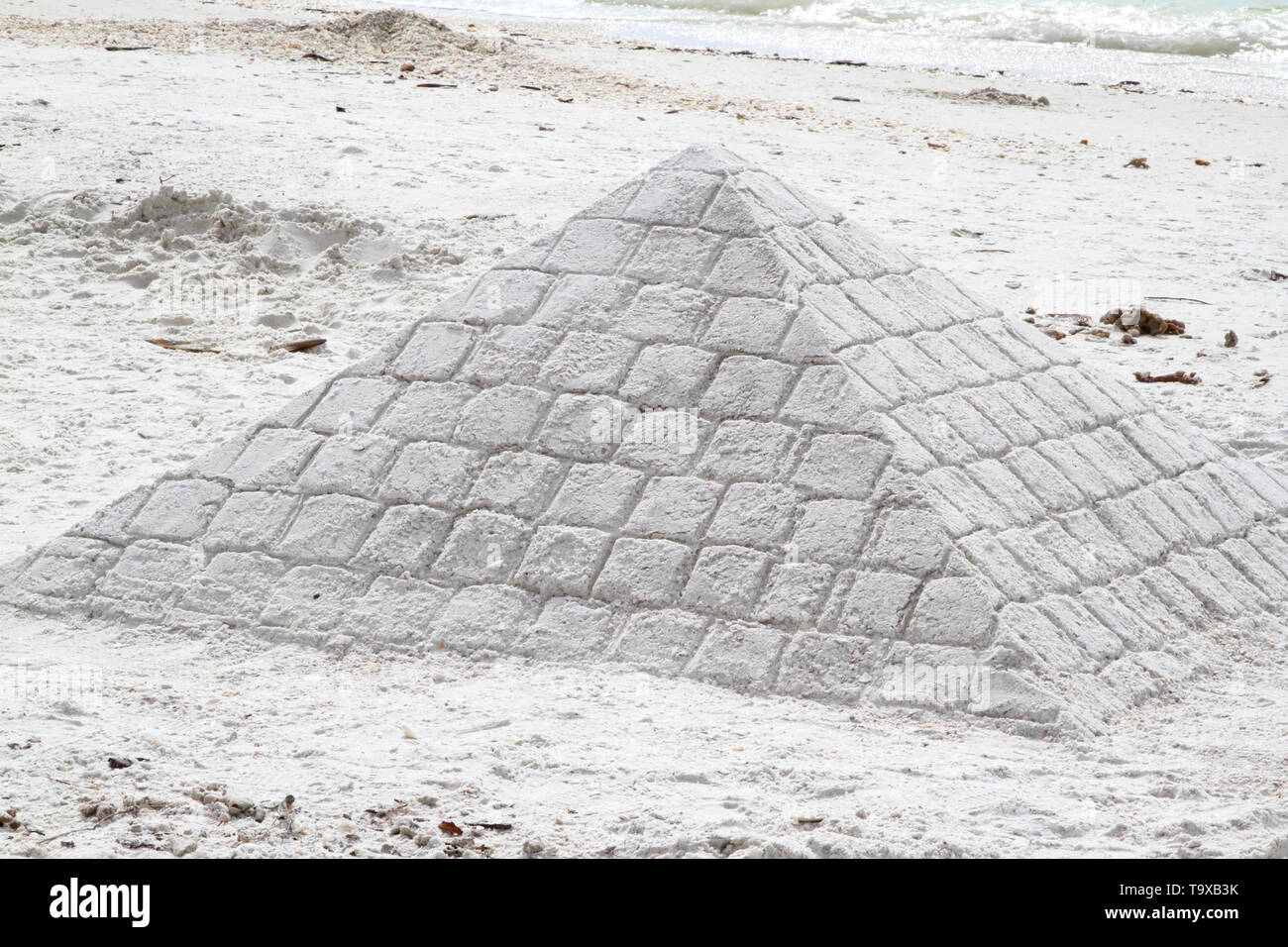 Sand pyramid sculpture on a beach Stock Photo - Alamy