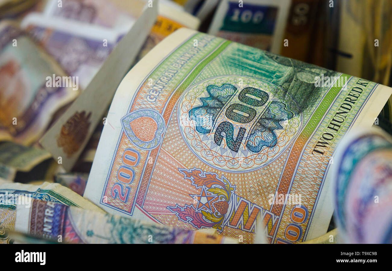 Pile of Burmese money in donation box at Kuthodaw Pagoda (Mandalay ...