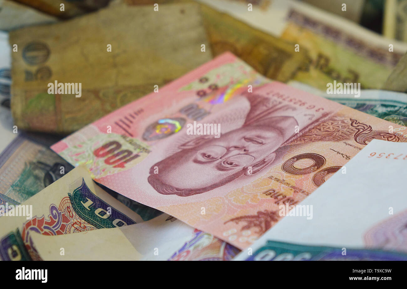 Pile of Burmese money in donation box at Kuthodaw Pagoda (Mandalay ...