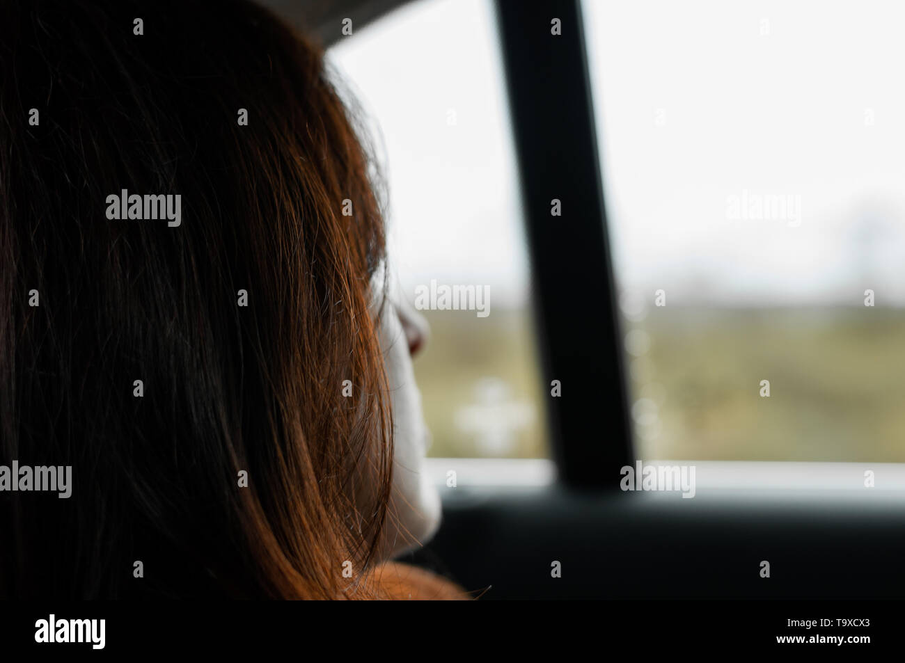 Relaxing while driving in a car Stock Photo - Alamy