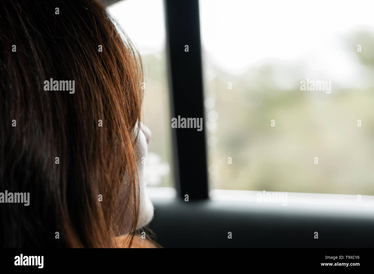 Relaxing while driving in a car Stock Photo - Alamy