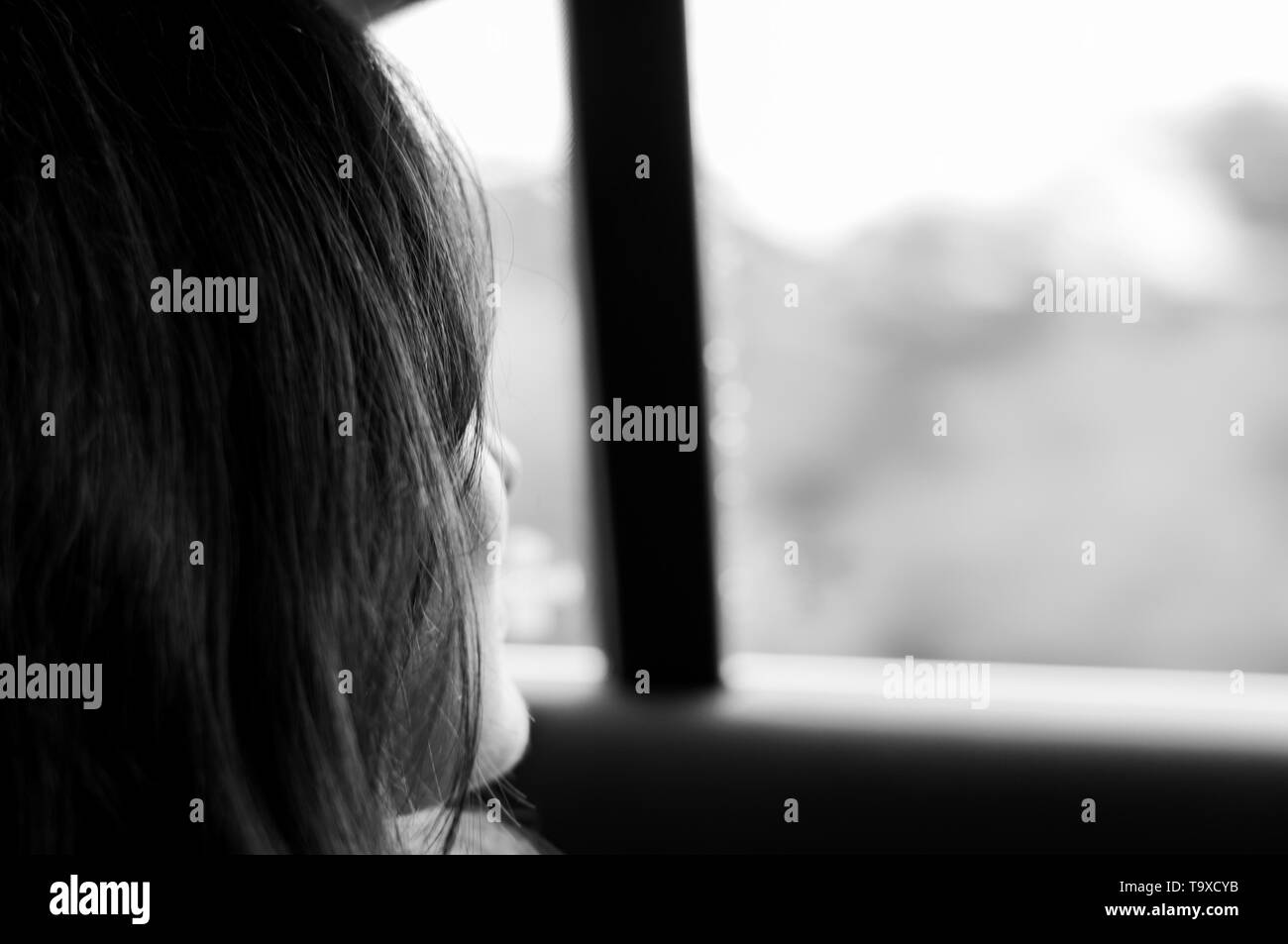 Relaxing while driving in a car Stock Photo - Alamy