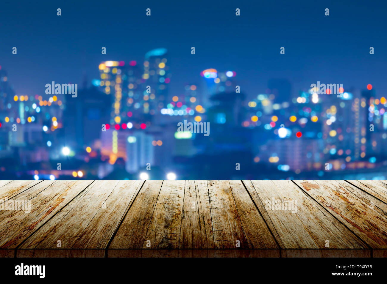Empty table over city night background isolation Stock Photo - Alamy