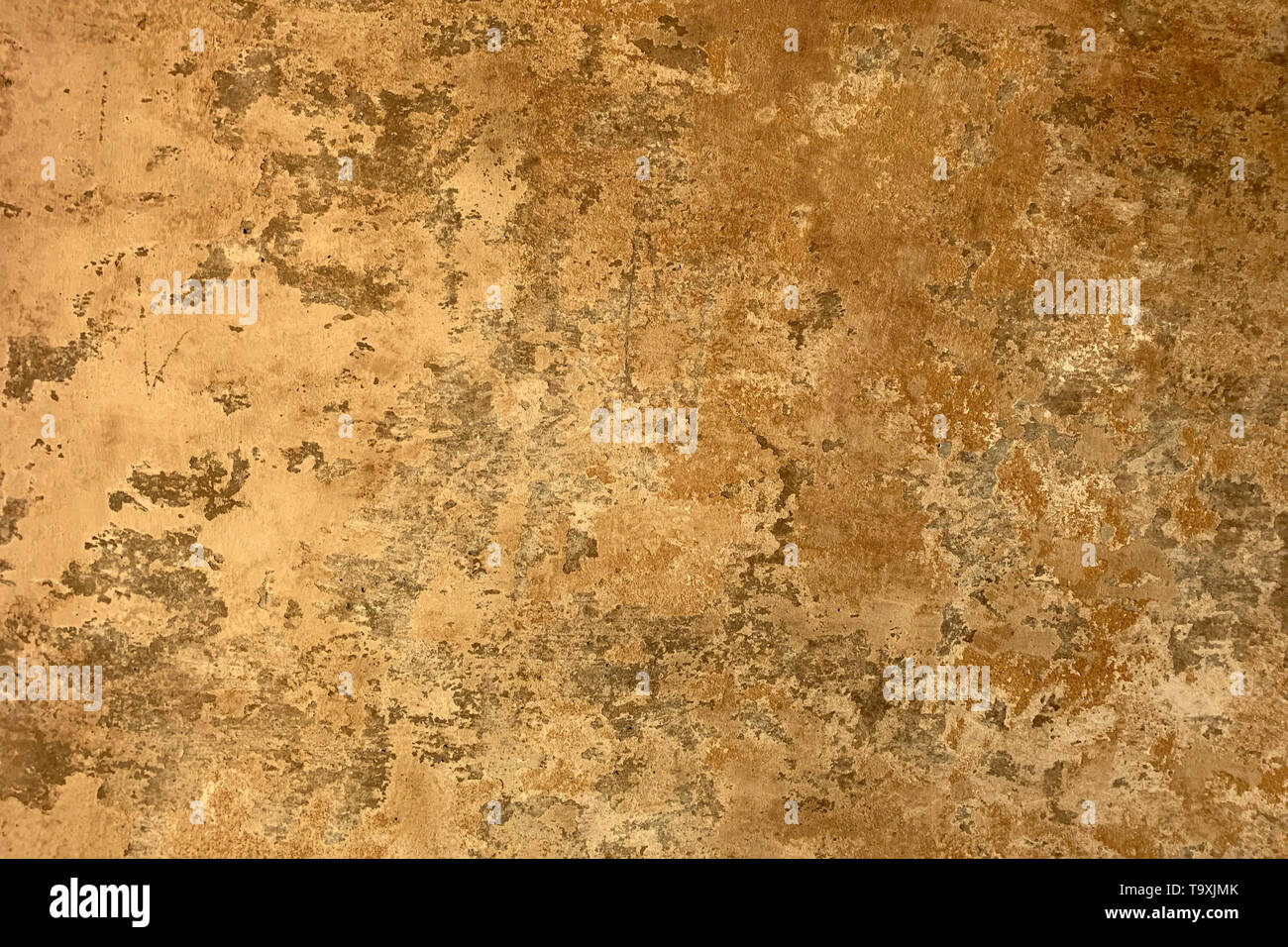 Texture modern pattern gold wall with weathered paint Stock Photo - Alamy