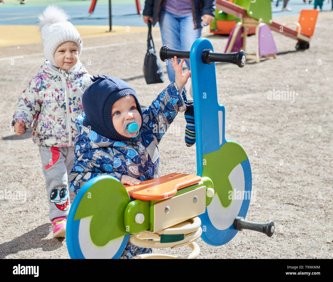 Small children play on the playground. child development. children's ...