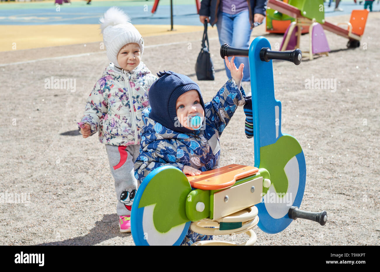 Small children play on the playground. child development. children's ...