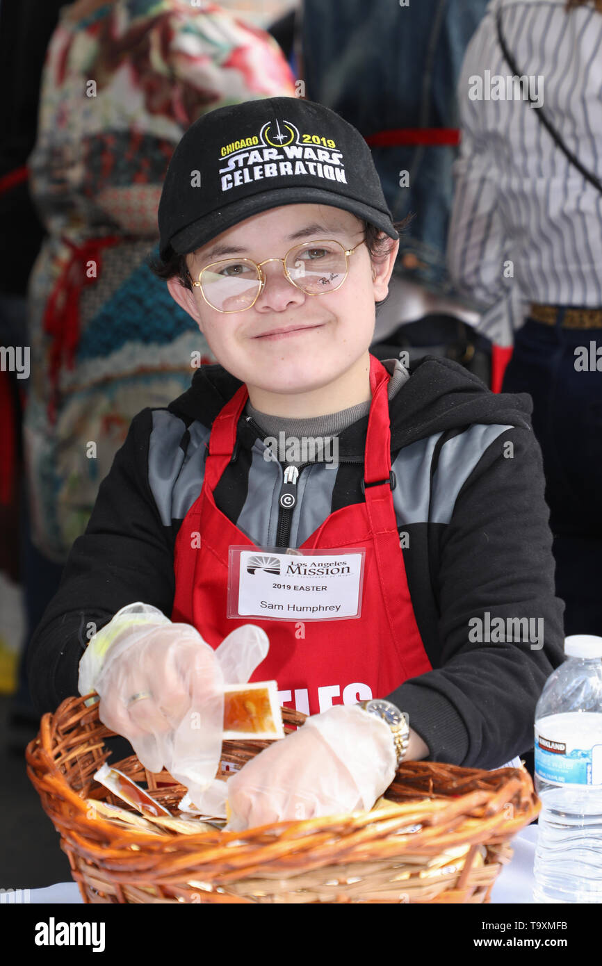 Celebrities and volunteers attend the LA Mission Easter charity dinner ...