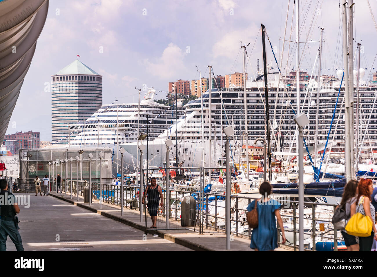 Passenger ships, ferries and yachts in the port - Porto Antico in Genoa ...