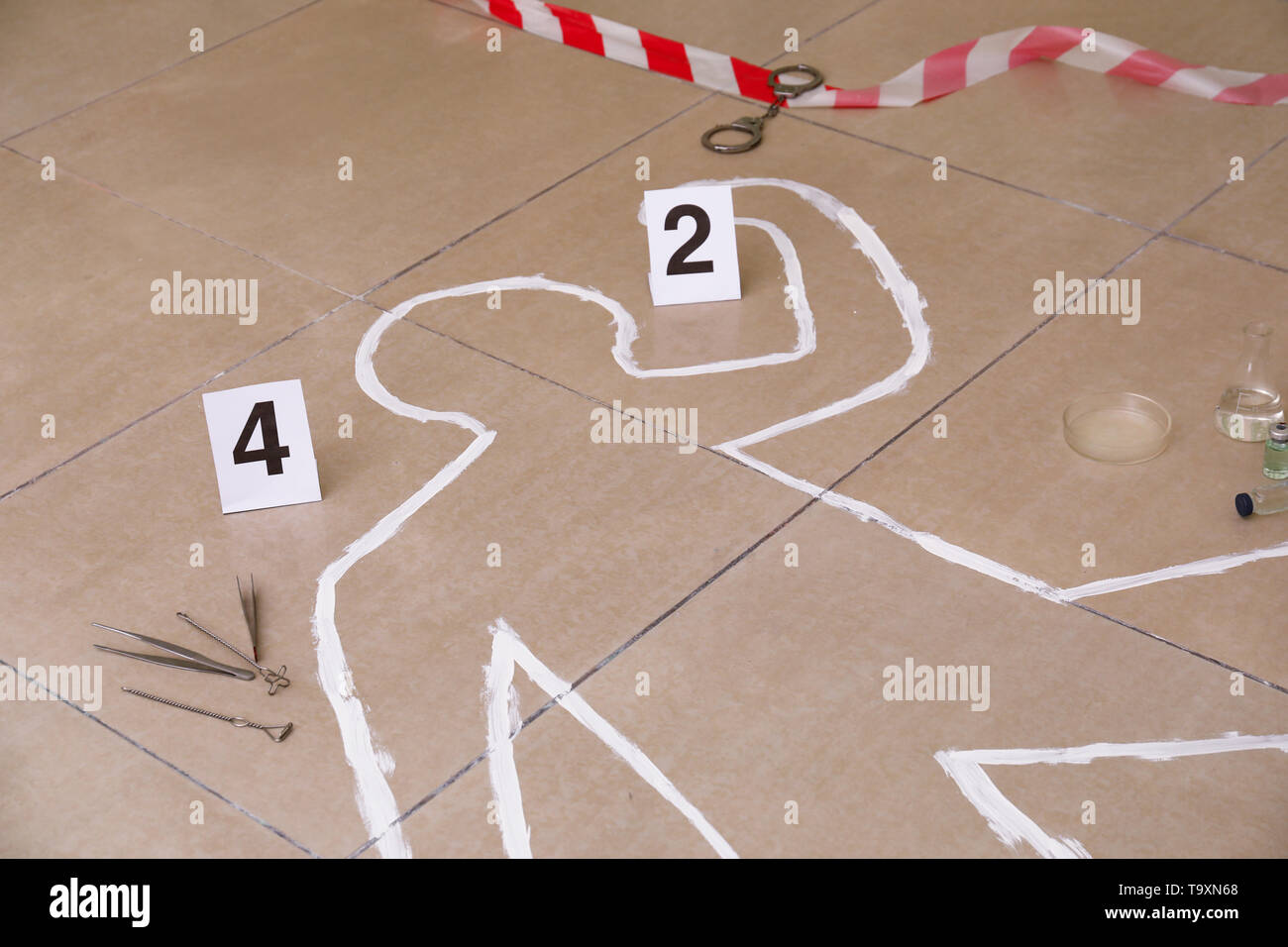 Crime scene with victim silhouette and evidences Stock Photo - Alamy