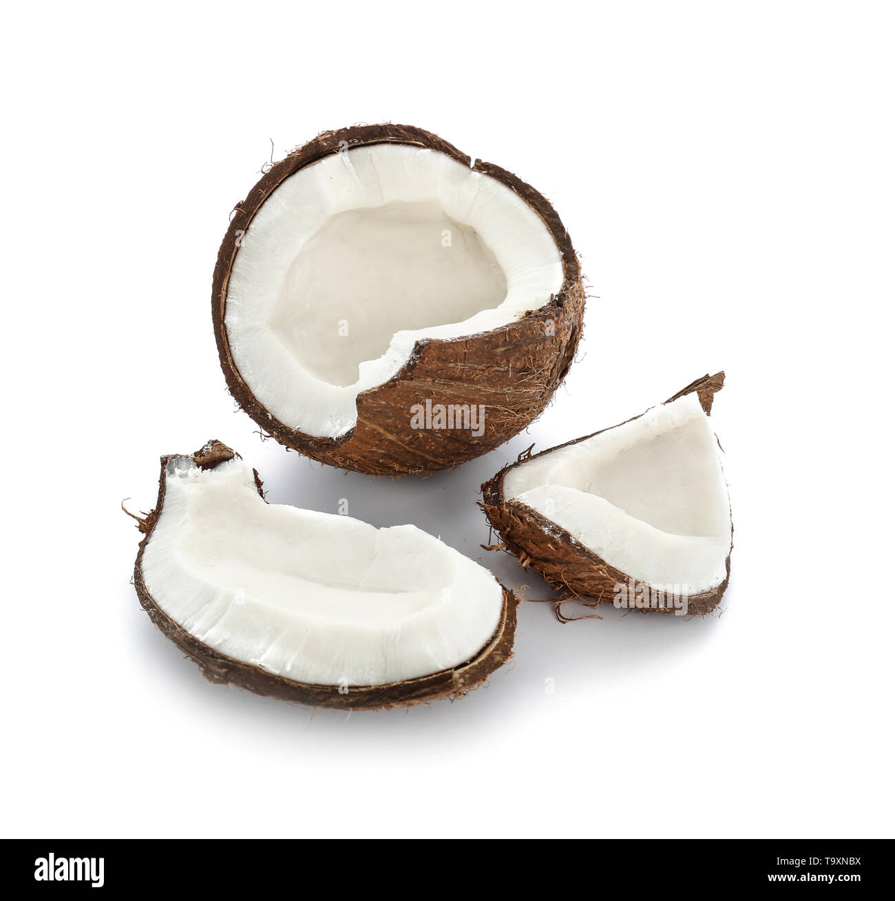 Cut ripe coconut on white background Stock Photo - Alamy