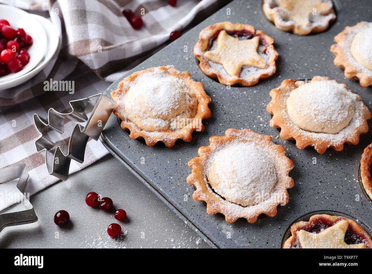 Baking tray with tasty mince pies on table Stock Photo - Alamy