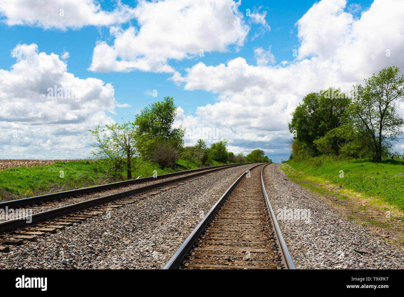 Train tracks through the Illinois countryside on a beautiful Spring ...