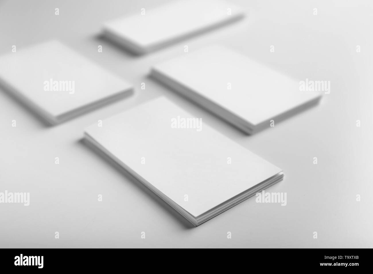 Blank business cards on white background Stock Photo - Alamy