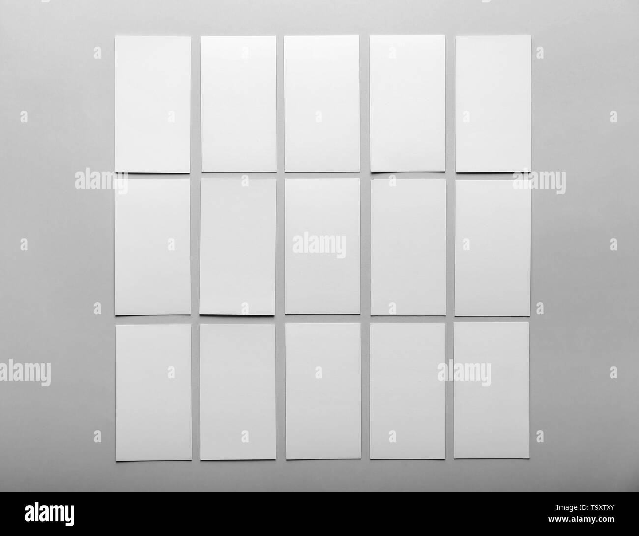 Many blank business cards on light background Stock Photo - Alamy