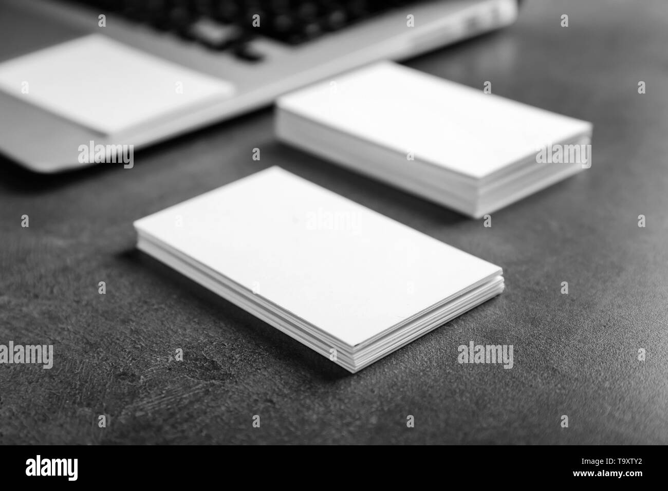 Blank business cards on dark background Stock Photo - Alamy