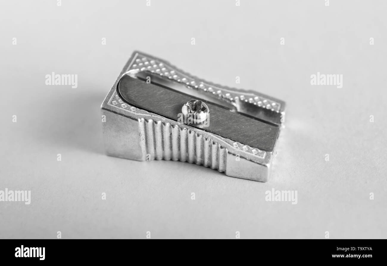 Pencil sharpener on light background Stock Photo - Alamy