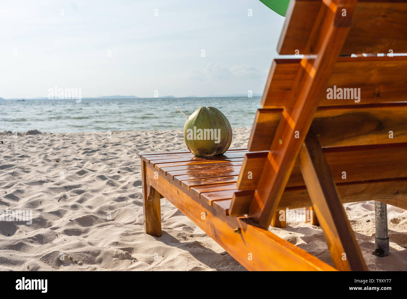 Fresh coconut on the beautiful white sand beach Stock Photo - Alamy
