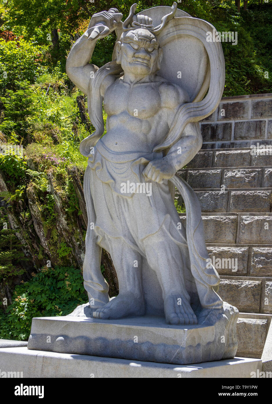 Stone demon guard statuesque, guardian statue at the entrance to the ...
