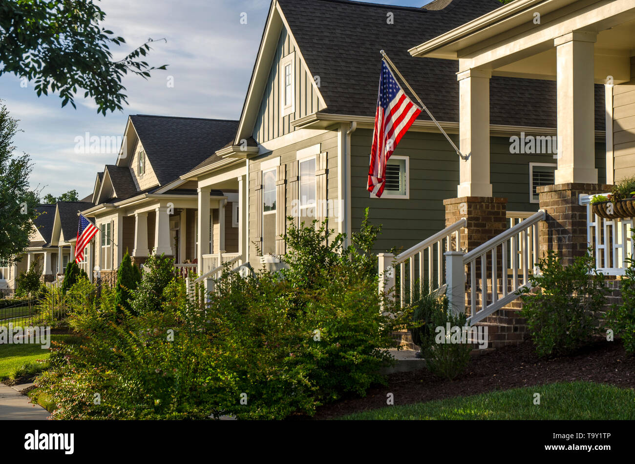 Patriotic Neighborhood with American Flags Stock Photo - Alamy
