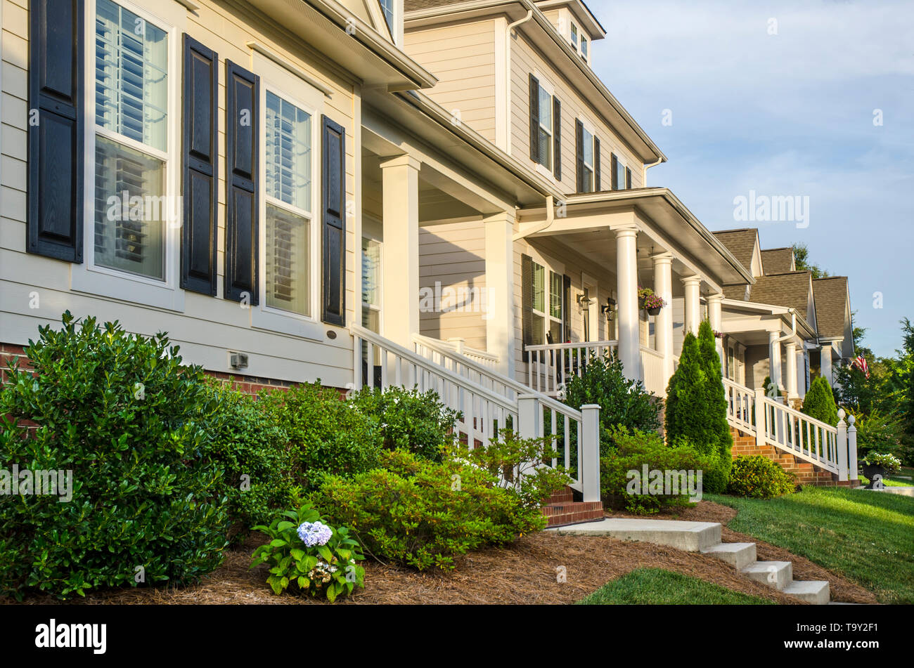 Row of Victorian-style Homes in a Surburban Neighborhood Stock Photo ...