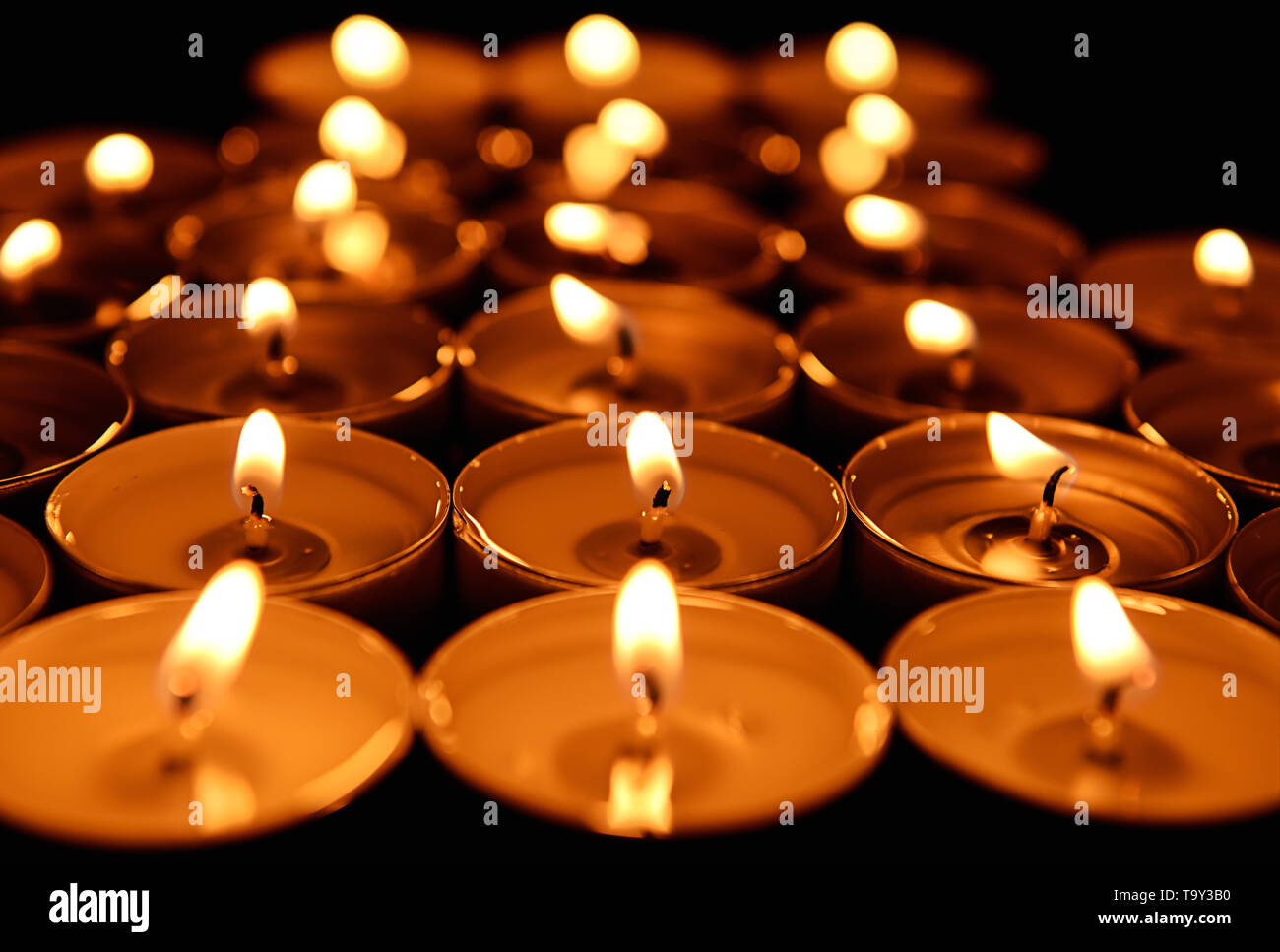Beautiful rows of candles hi-res stock photography and images - Alamy