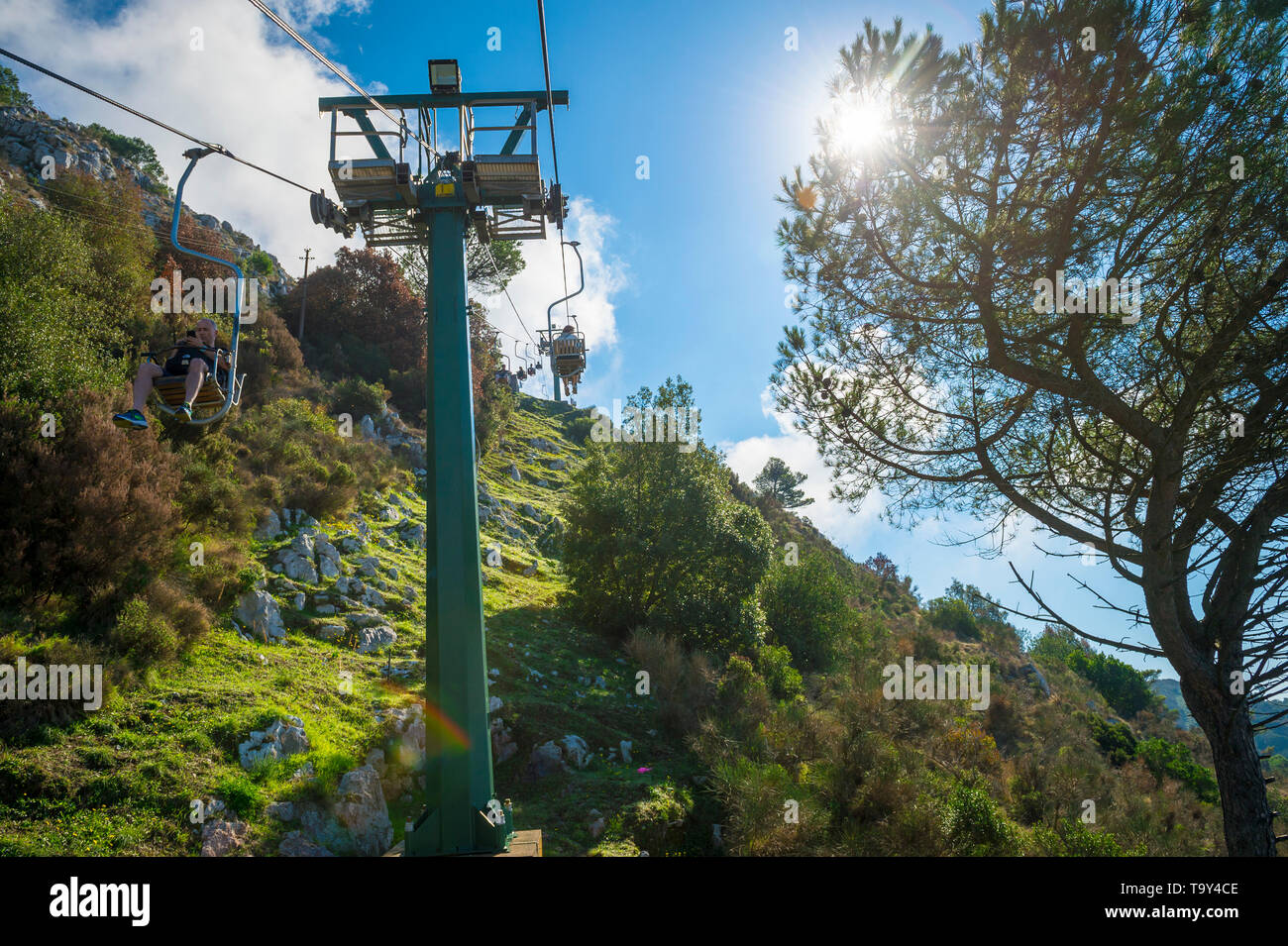 CAPRI, ITALY - OCTOBER, 2017: Visitors take photos as they ride the ...