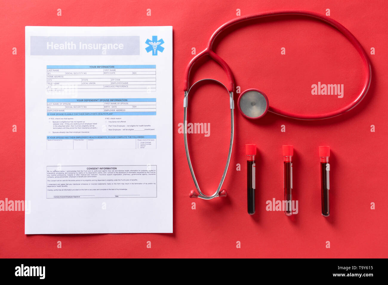 Medical insurance form with stethoscope and blood samples on color ...