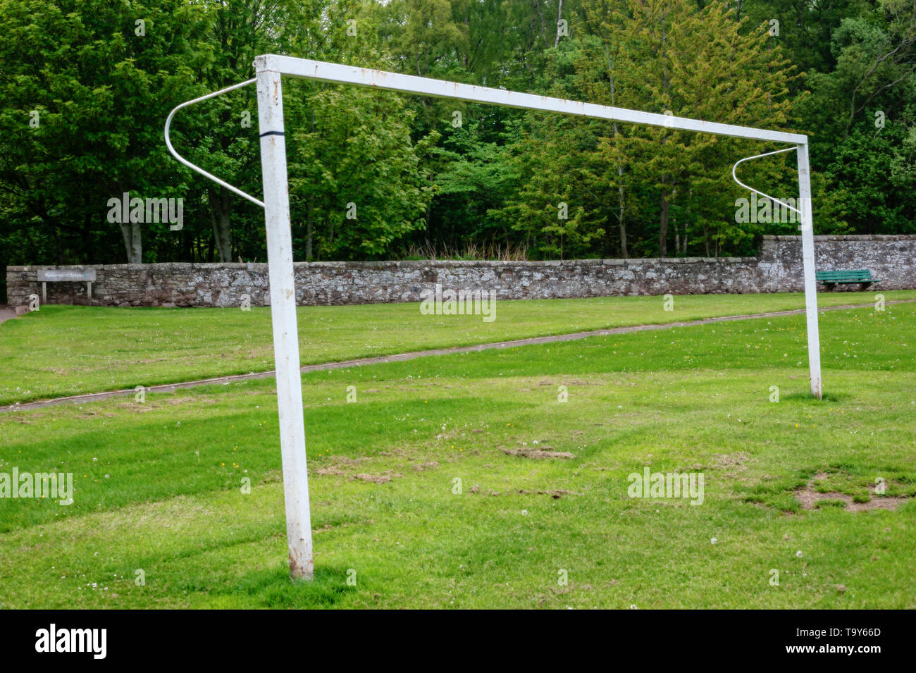 Isolated goal posts without netting against a background of grass ...
